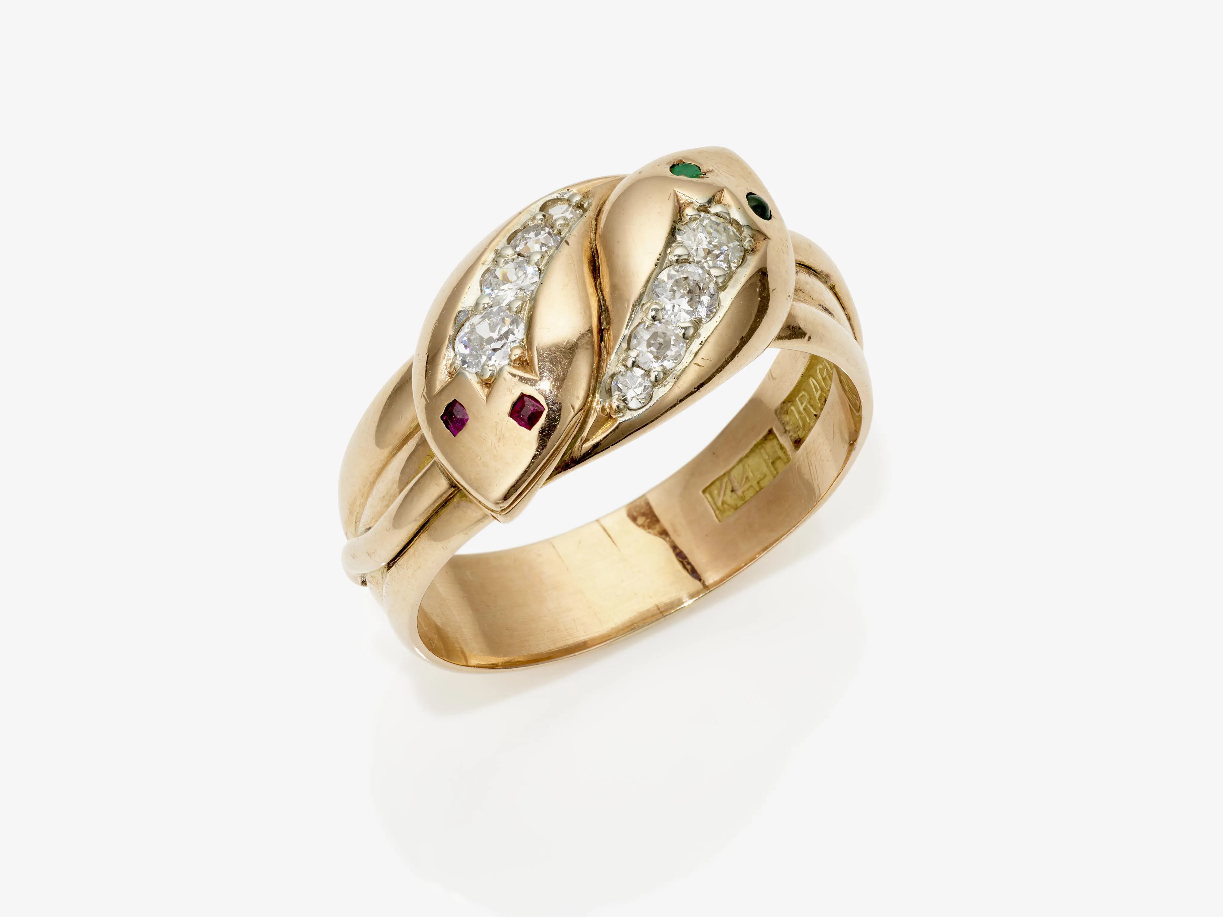 A men's snake ring with diamonds, emeralds and rubies | Widewalls