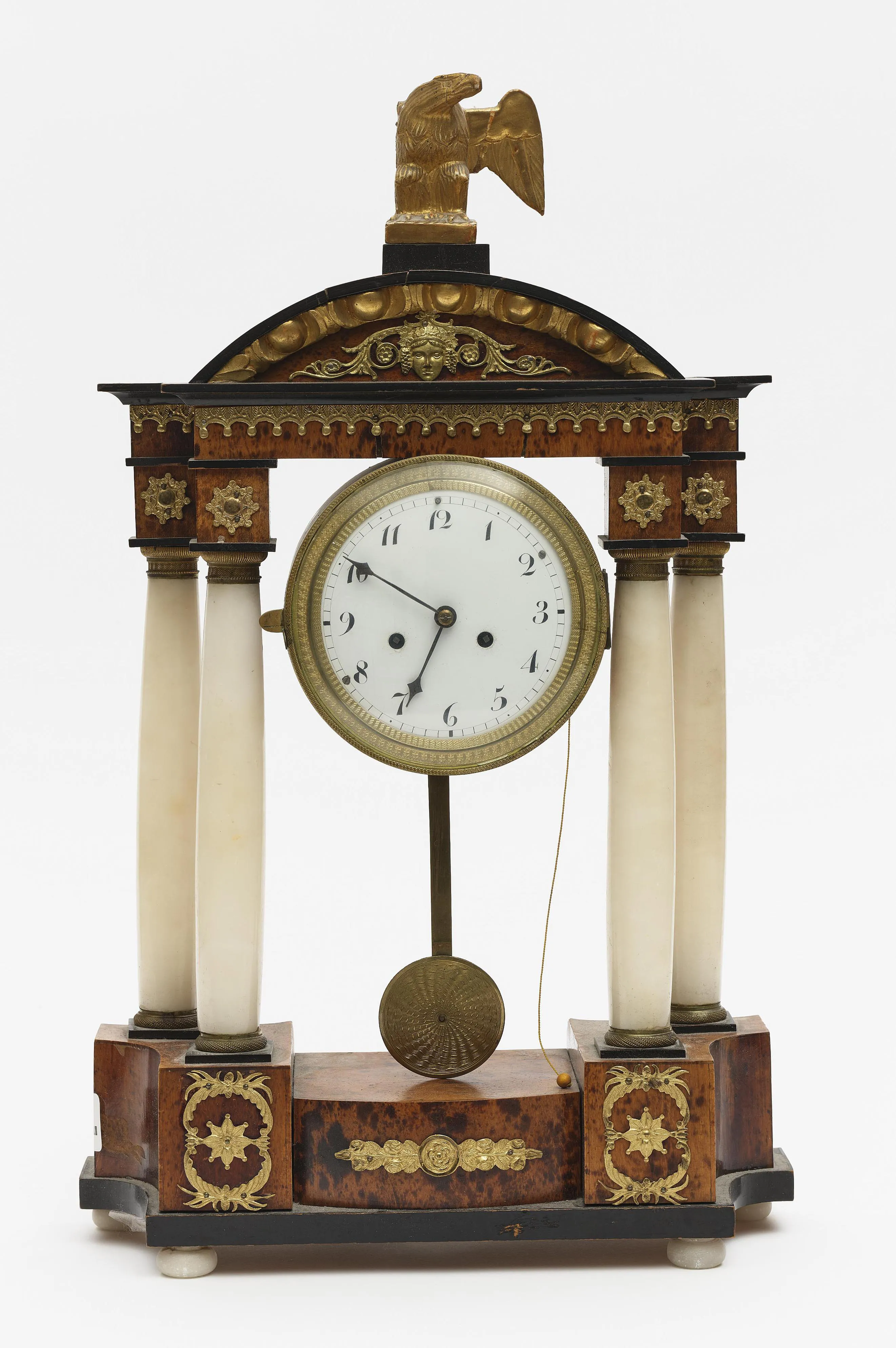 A portico clock | Widewalls