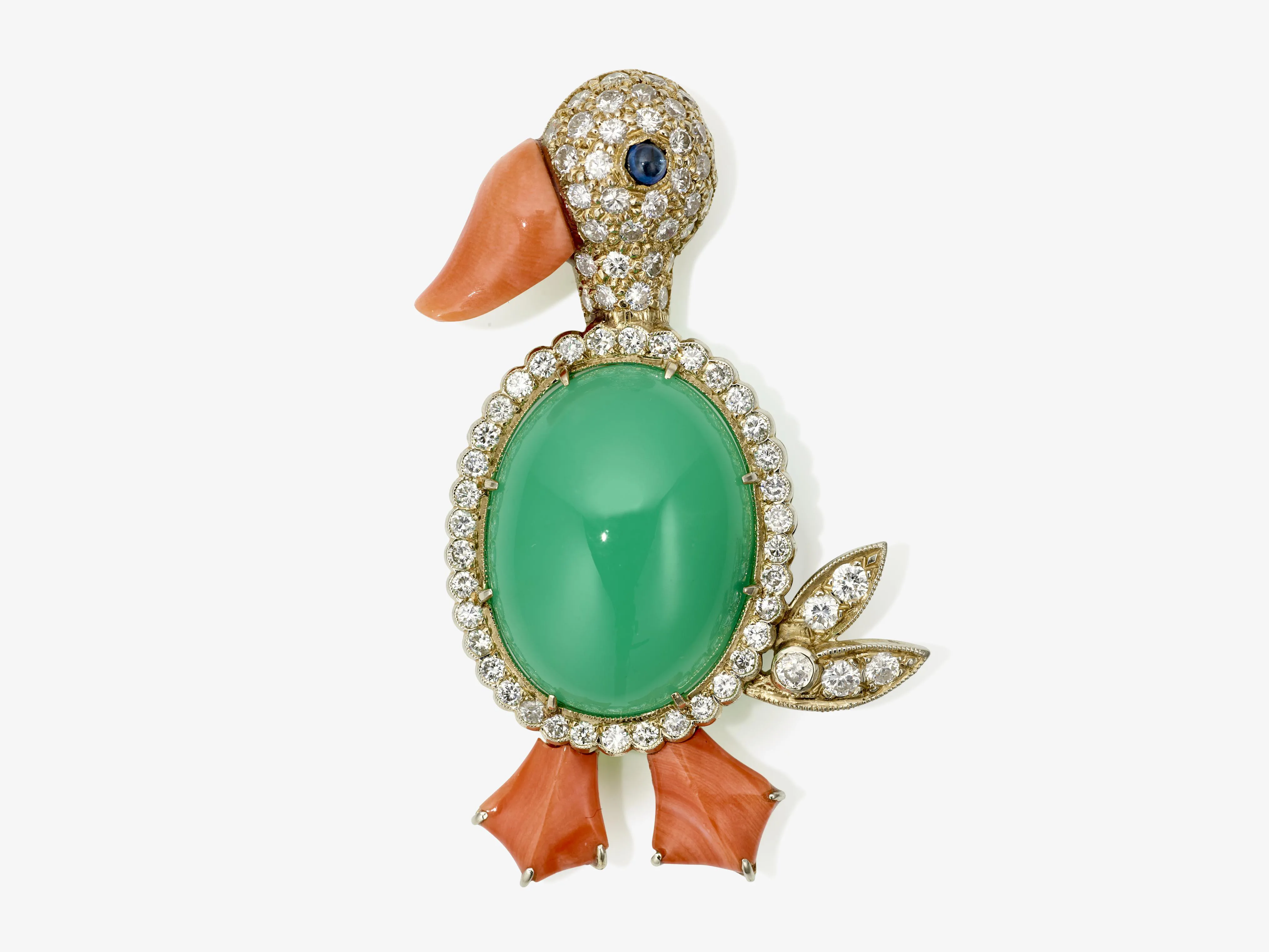 A brooch in the shape of a stylized duck decorated with a chrysoprase ...