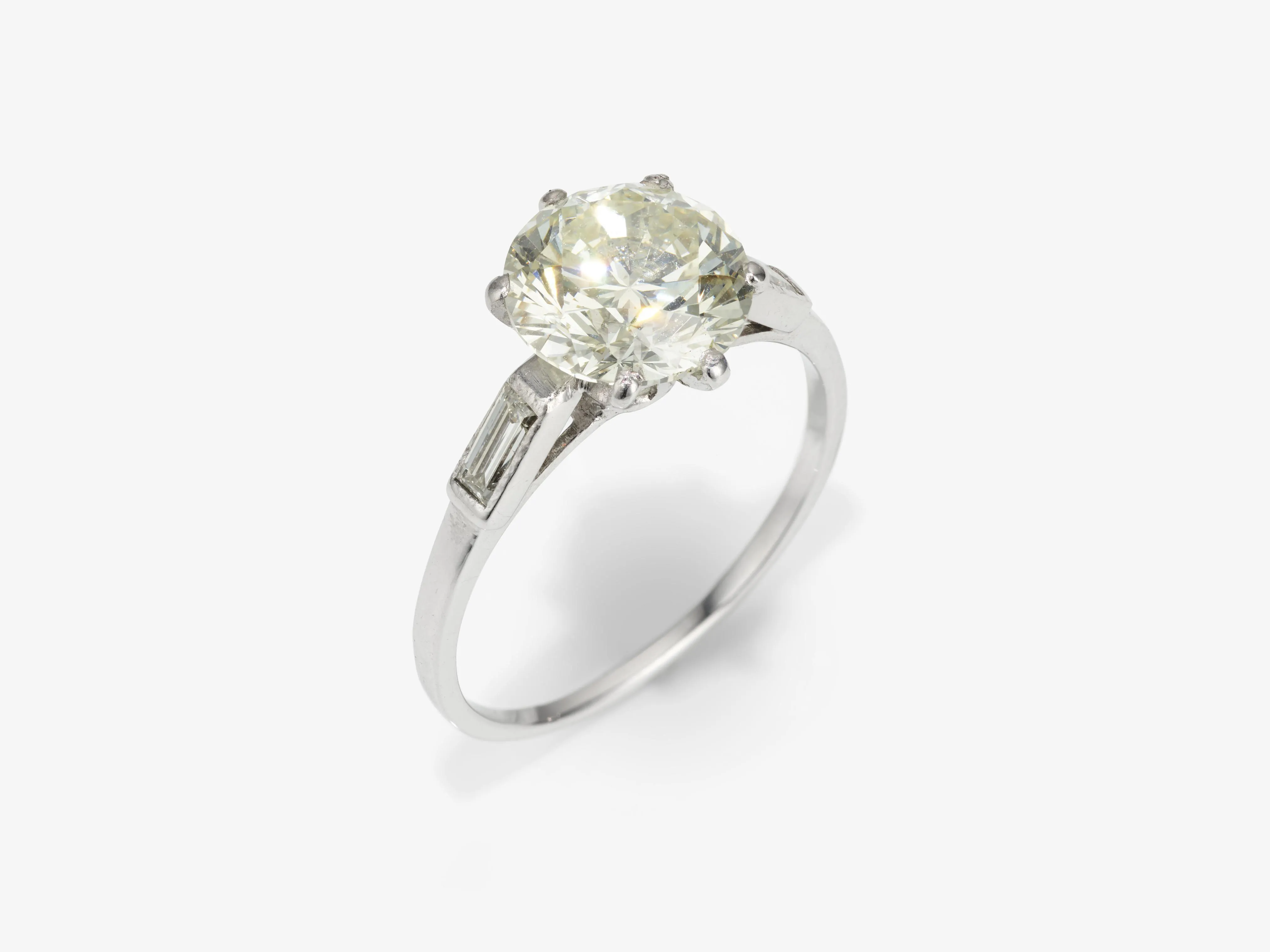 An eternity brilliant-cut diamond ring with a historic transitional-cut ...