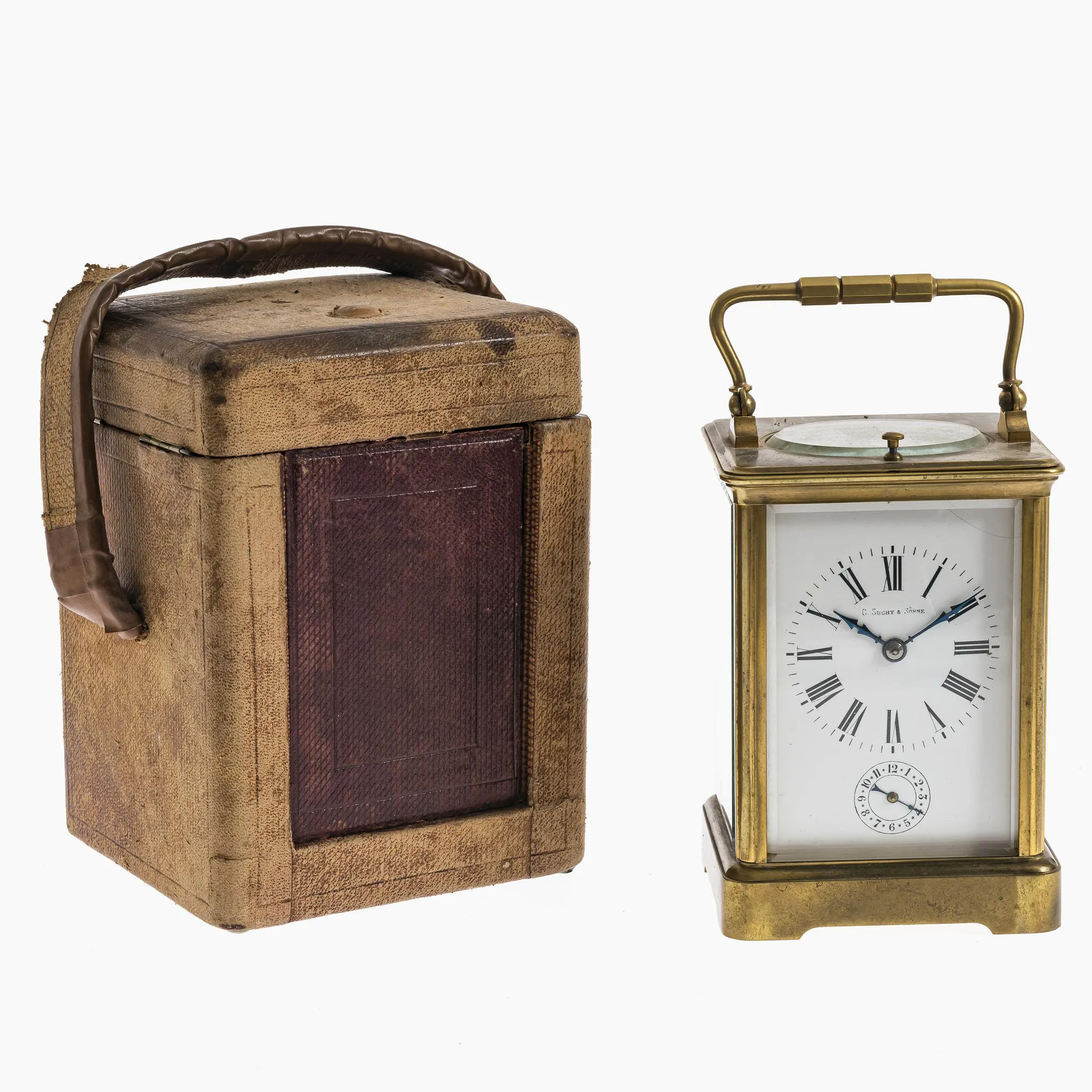 A travel alarm clock with leather case | Widewalls