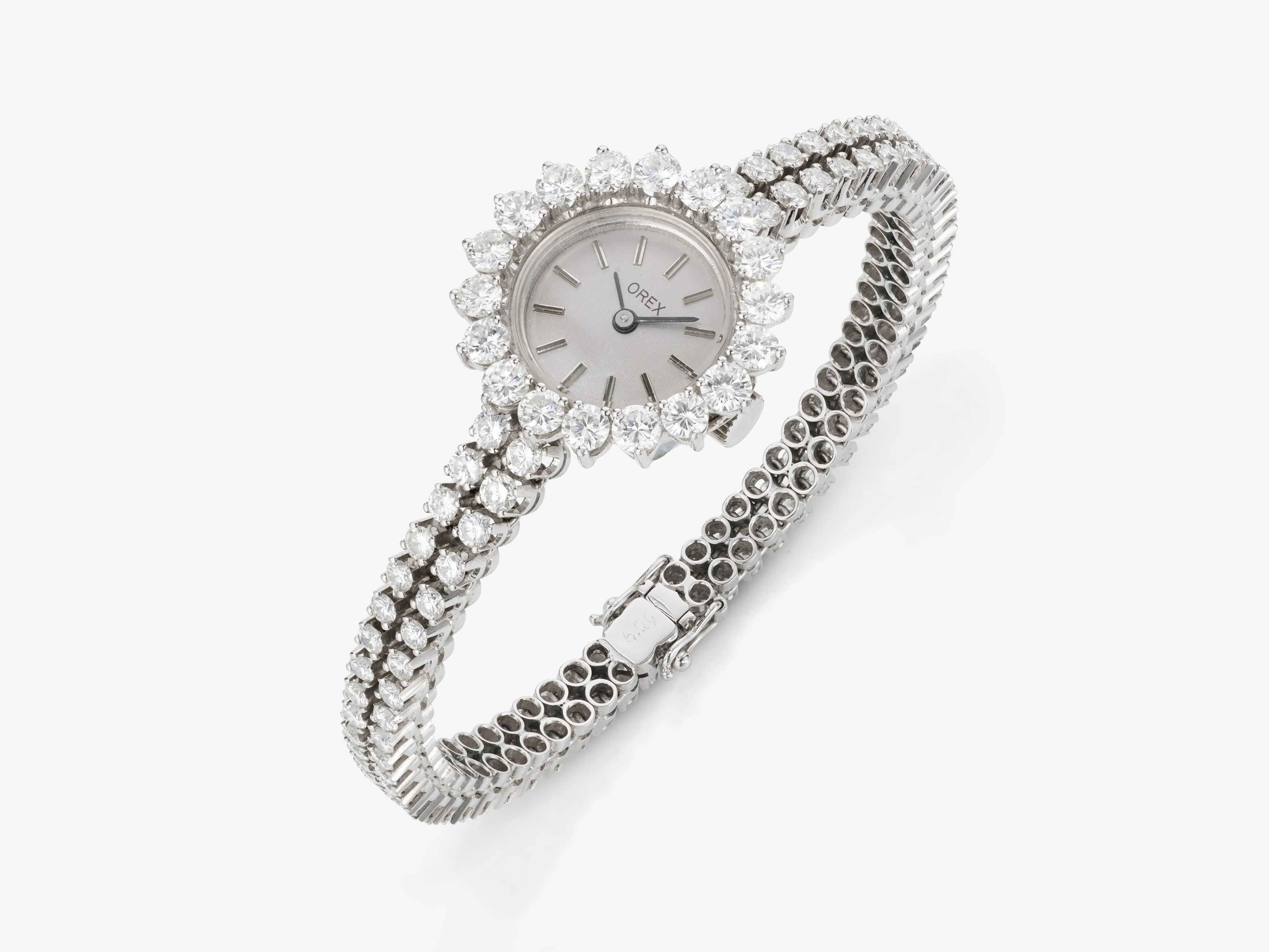 An Elegant Ladies Cocktail Watch Decorated With Brilliant-Cut Diamonds ...