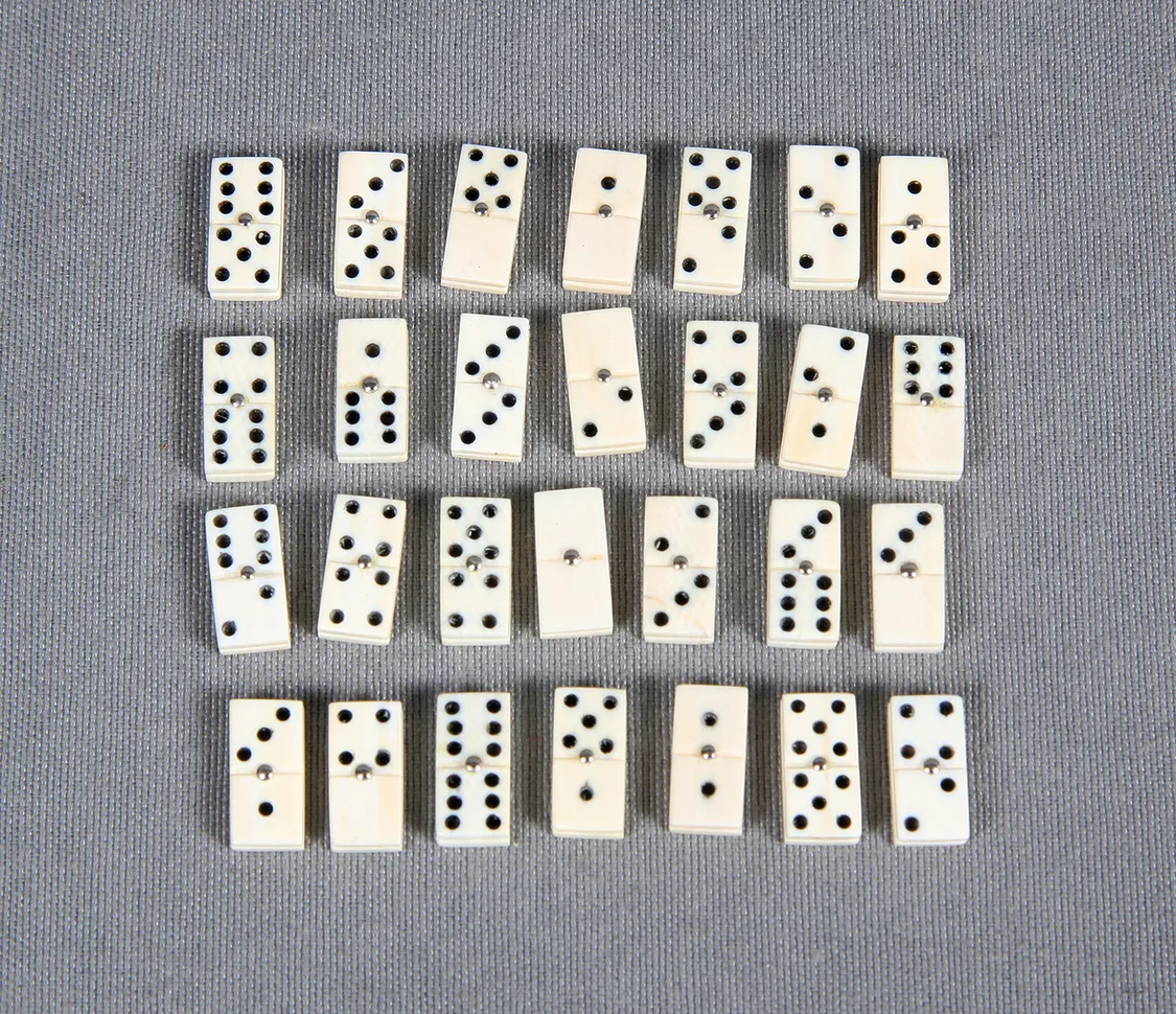 An Ivory Mini Domino Set | Widewalls